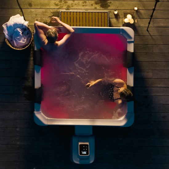 Mini whirlpool bath with 128 water and air jets for outdoor space with ...